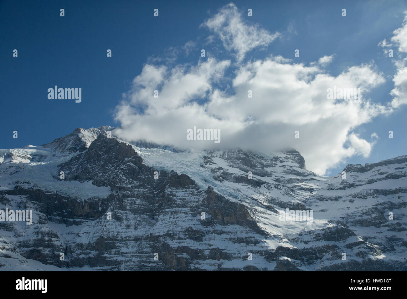 Snowy Mountains Peak with clouds Stock Photo - Alamy