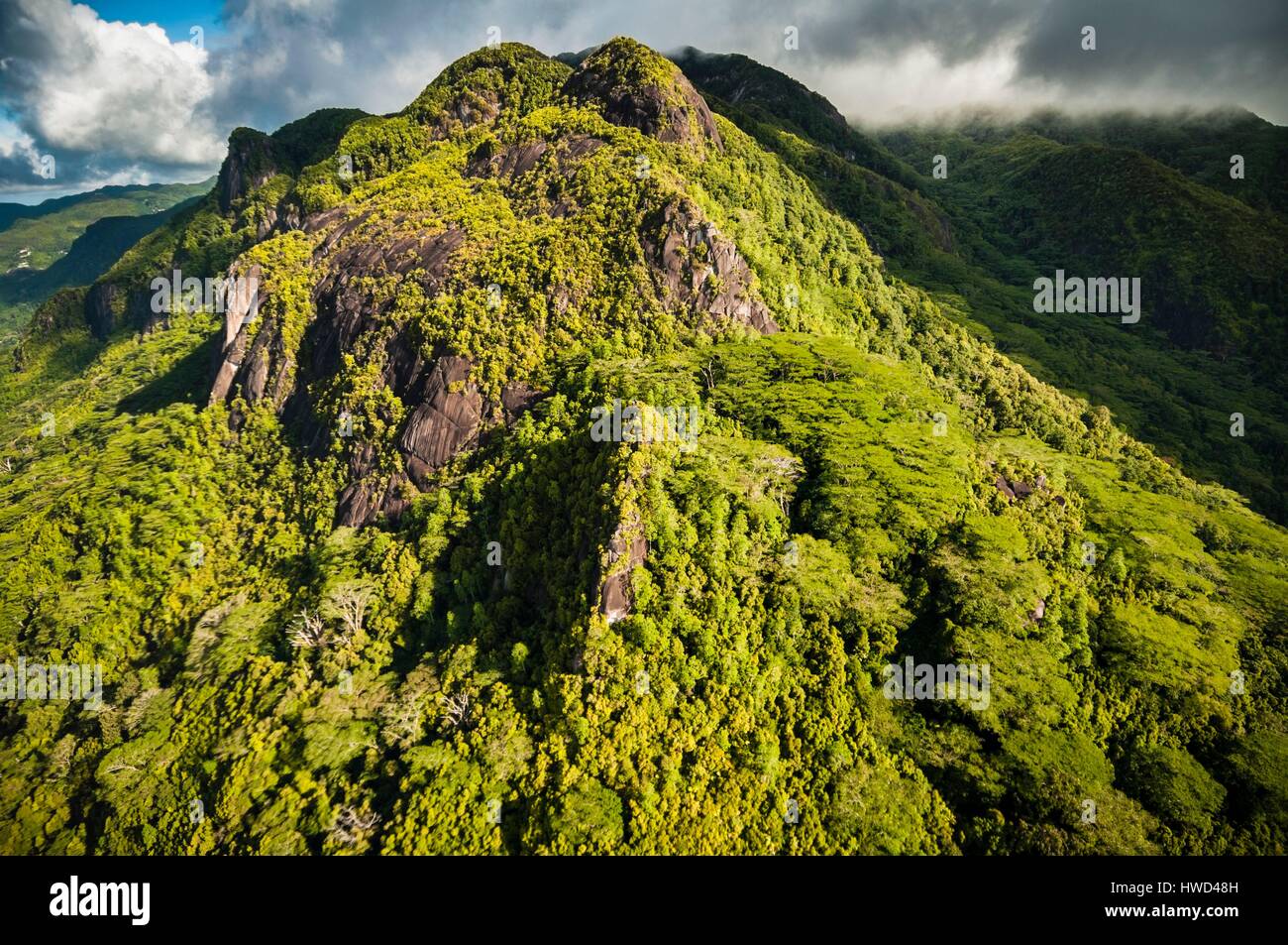 Seychelles, Mahe island, the rainforest and granite cliffs of the Morne ...