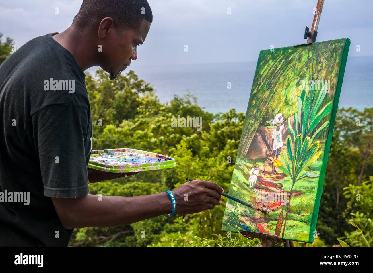 Seychelles, Mahe island, the painter Charles DODO in the garden of his ...