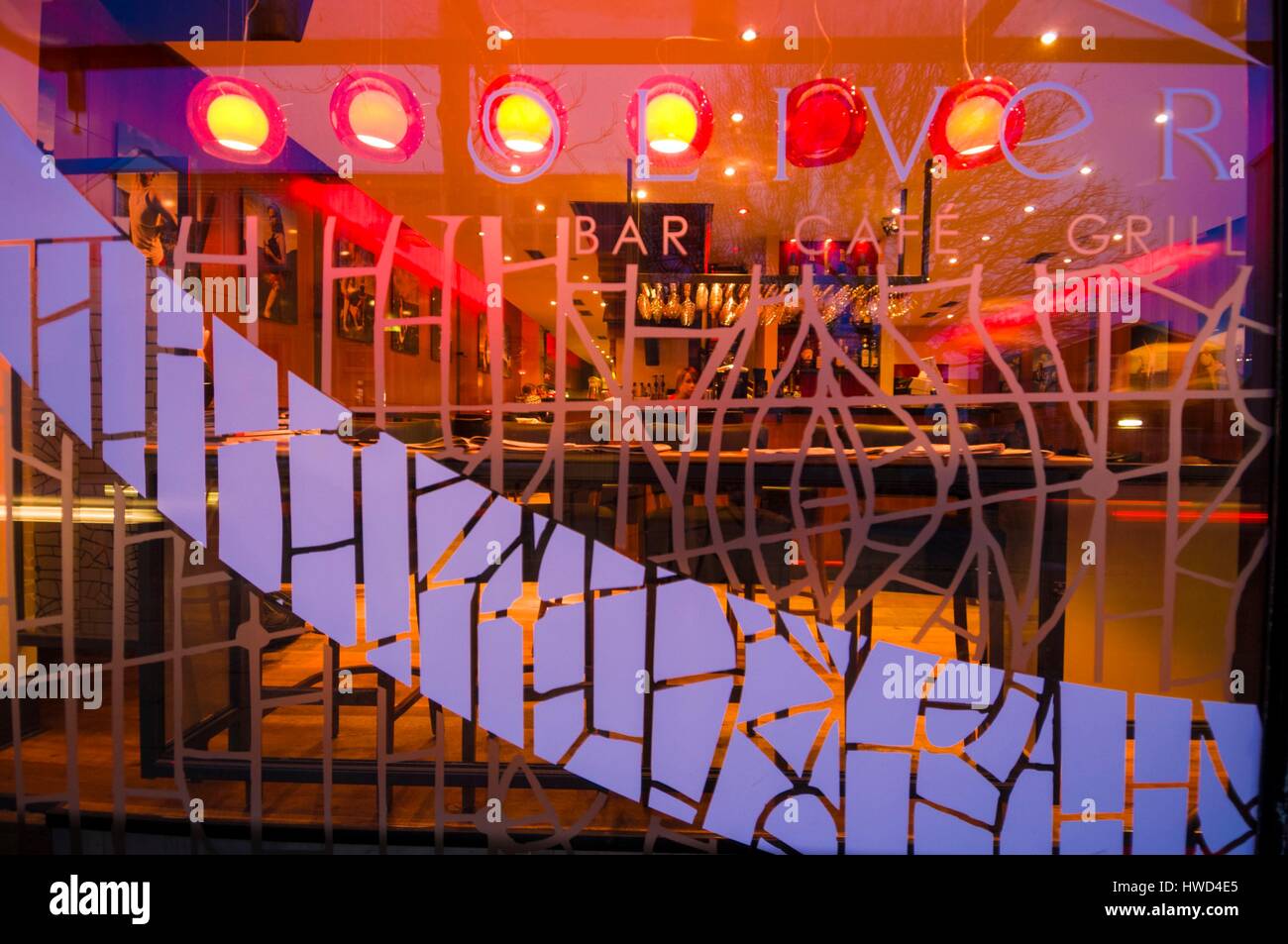 Iceland, Reykjavik, window of a bar in the capital lit up the evening ...