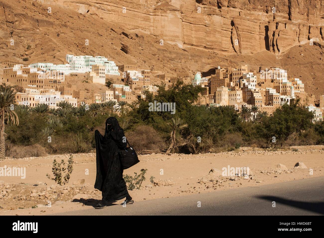 Yemen, clinging to the cliff, one of the many magnificent adobe ...