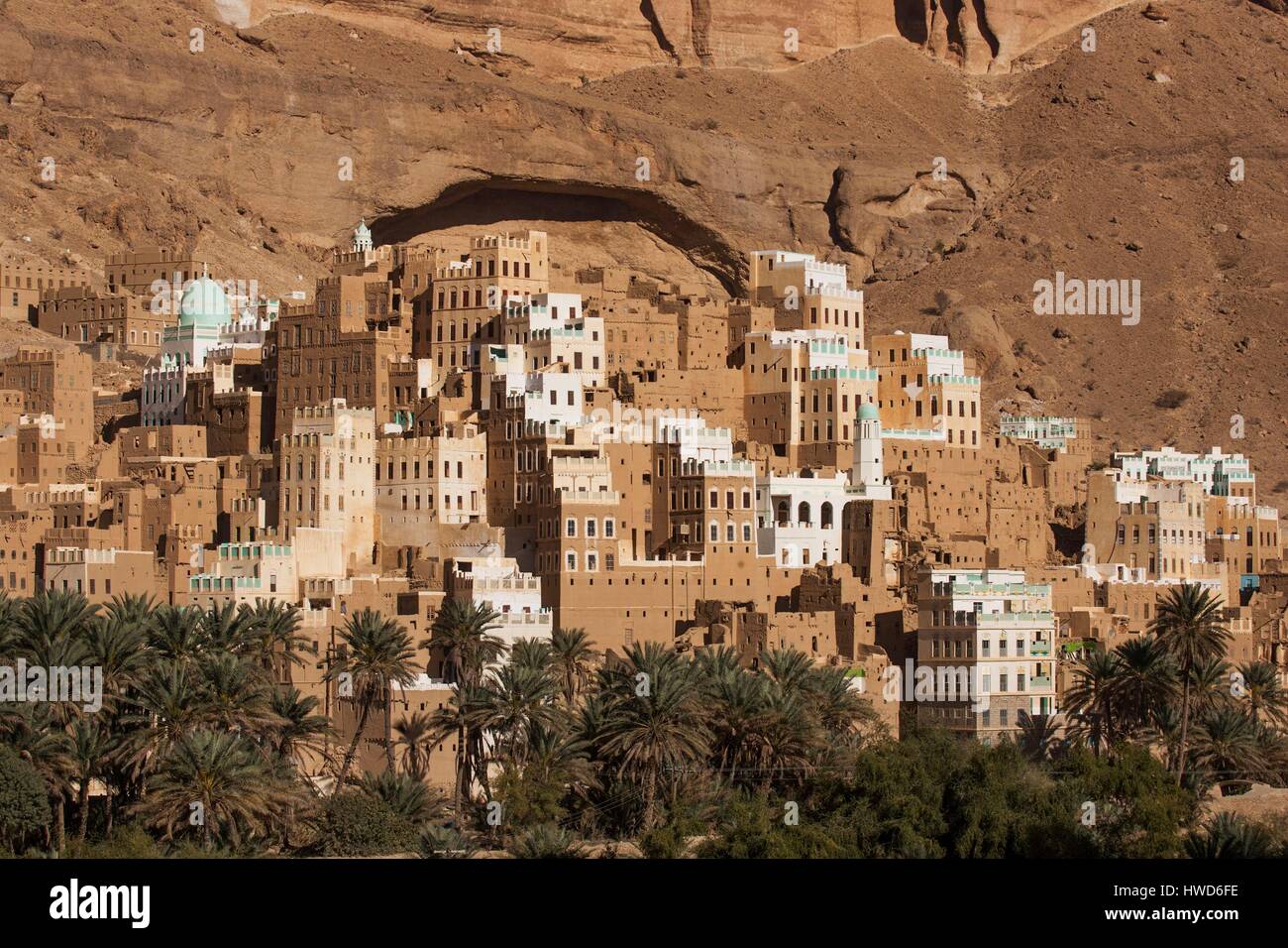 Yemen, clinging to the cliff, one of the many magnificent adobe ...