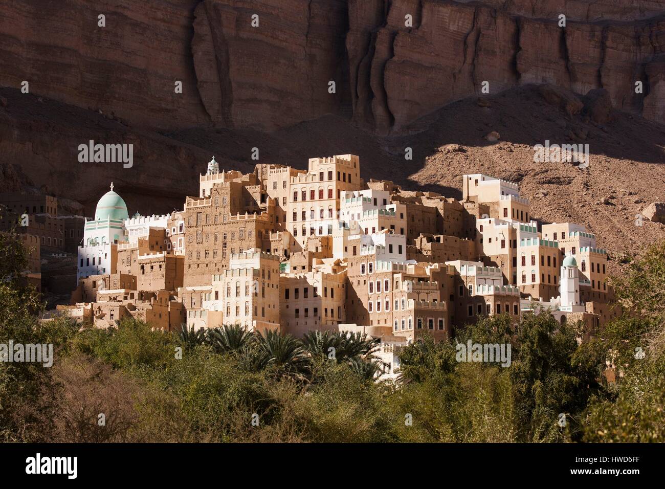 Yemen, clinging to the cliff, one of the many magnificent adobe ...