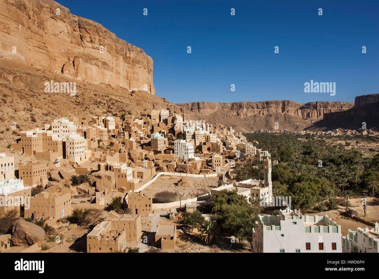 Yemen, clinging to the cliff, one of the many magnificent adobe ...