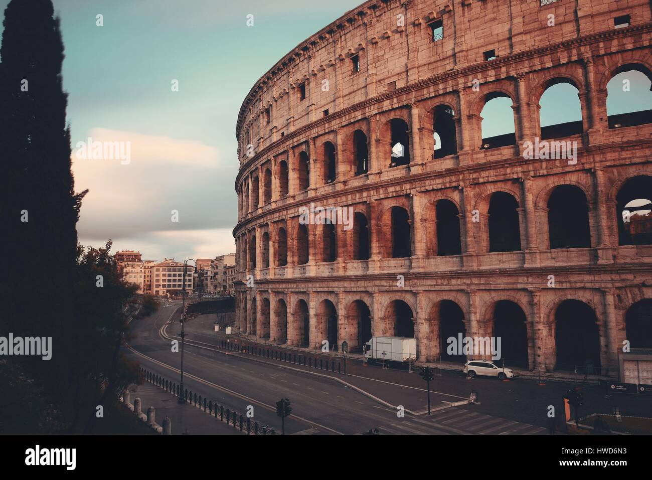 Colosseum with street view at sunset, the world known landmark and the ...