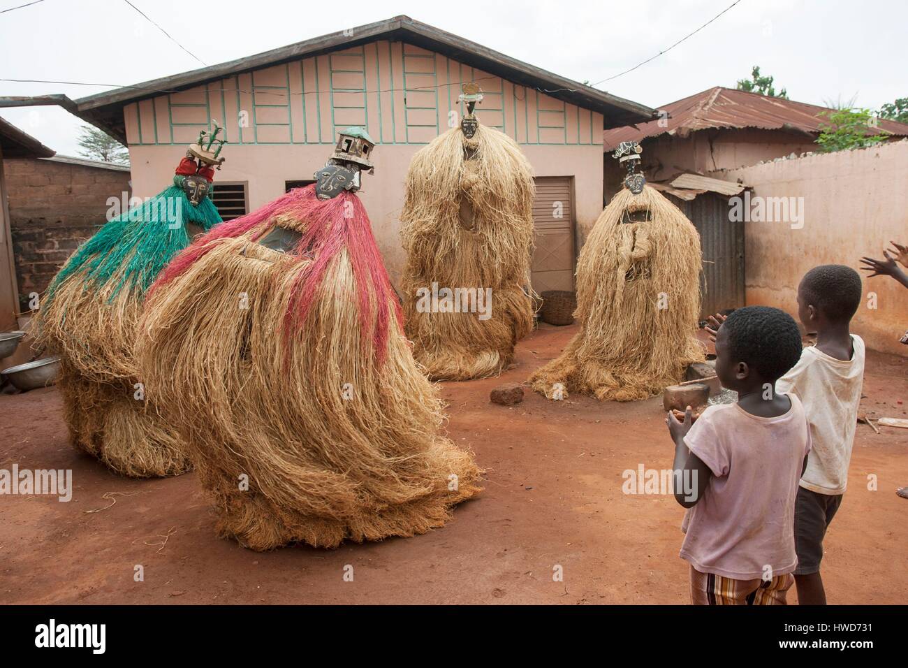 Benin, Zou Department, Abomey, Zangbeto is a mask covered with colorful ...