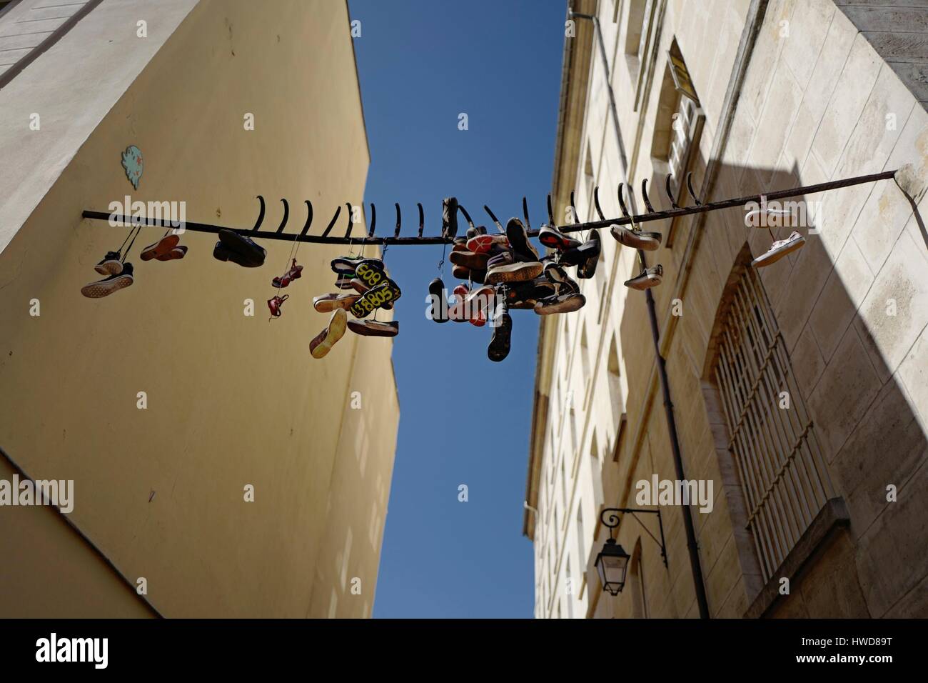 France, Paris, shoe tossing Stock Photo - Alamy