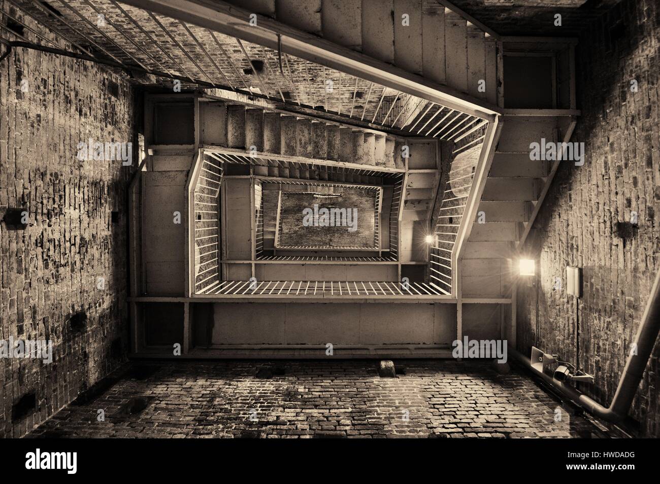 Staircase inside clock tower in Lucca with historic buildings in Italy ...