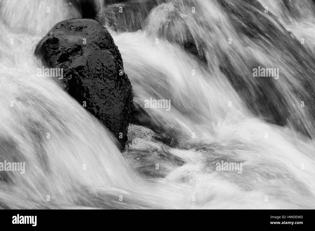 Fast flowing spring waterfall Black and White Stock Photos & Images - Alamy