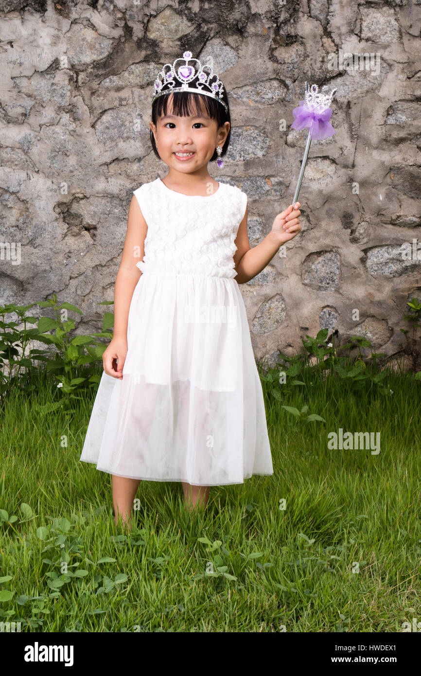 Asian Little Chinese Girl in Princess Costume at outdoor Stock Photo ...