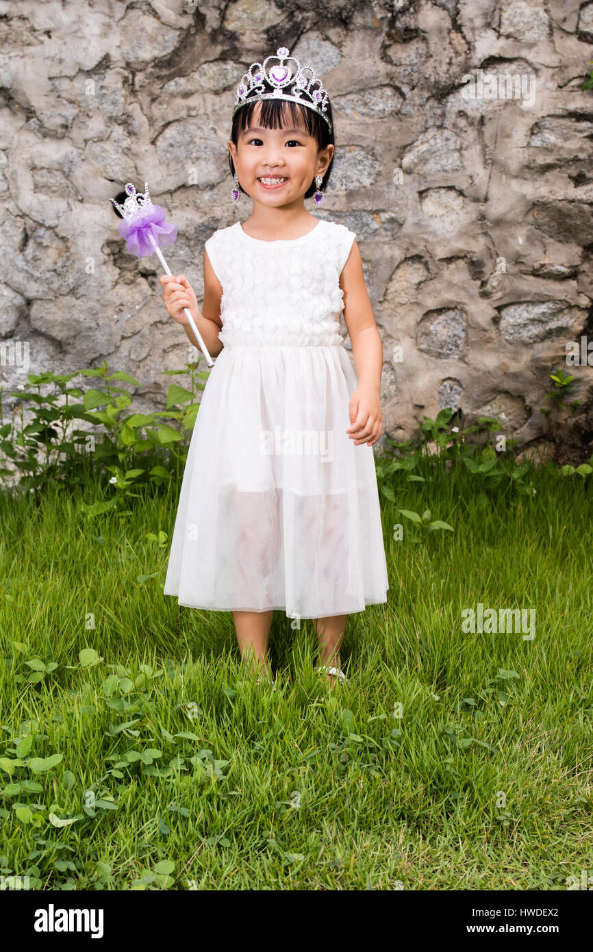 Asian Little Chinese Girl in Princess Costume at outdoor Stock Photo ...