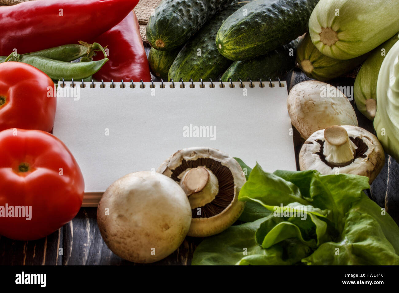 Fresh vegetables on a brown background with paper Stock Photo - Alamy