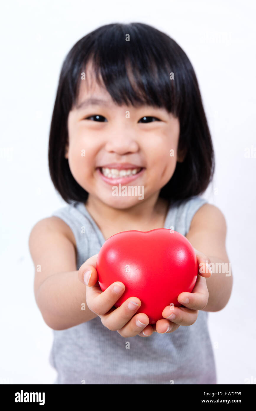 Asian Little Chinese Girl Holding Red Heart in isolated White ...