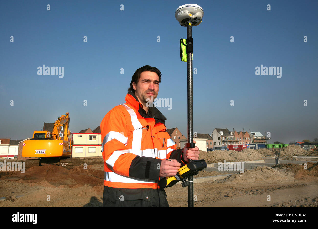 surveyor at work, measuring distance and altitudes Stock Photo - Alamy