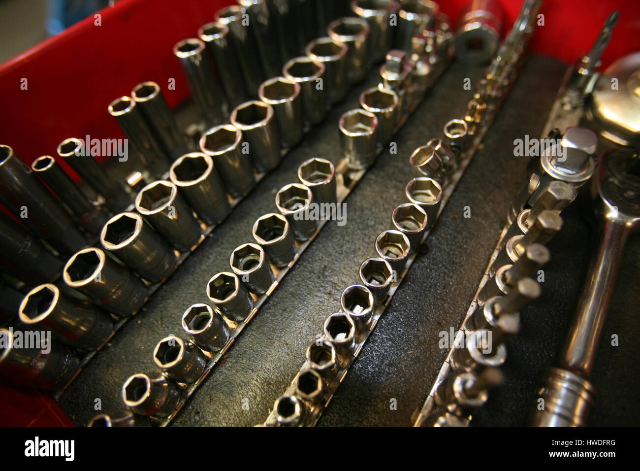 motor mechanic at work, maintaining engines in a workshop Stock Photo ...