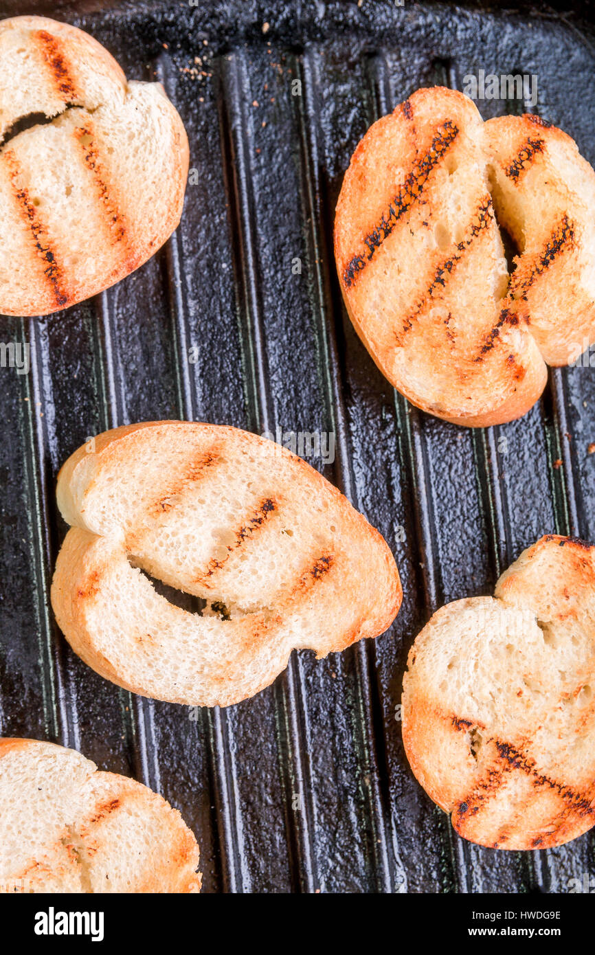 Grilled toast on pan. Top view Stock Photo - Alamy