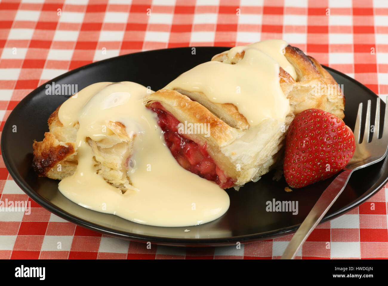 fresh summer fruit strudel with vanilla custard sauce Stock Photo - Alamy