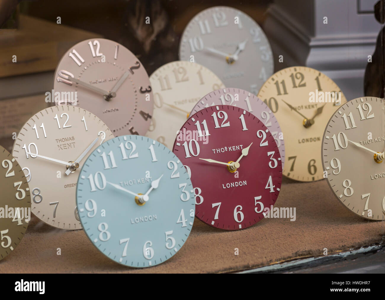 Different coloured clock faces hi-res stock photography and images - Alamy