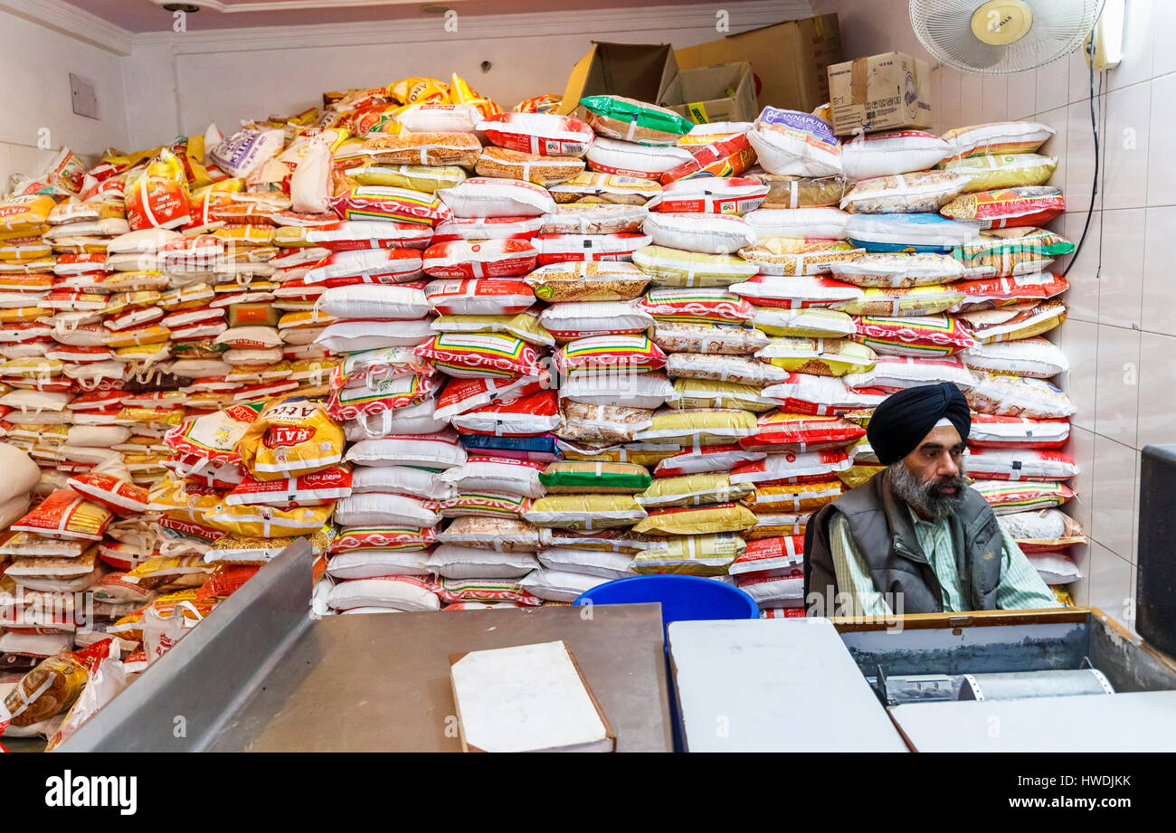 Colourful sacks full of donated food stacked in the ration store ...