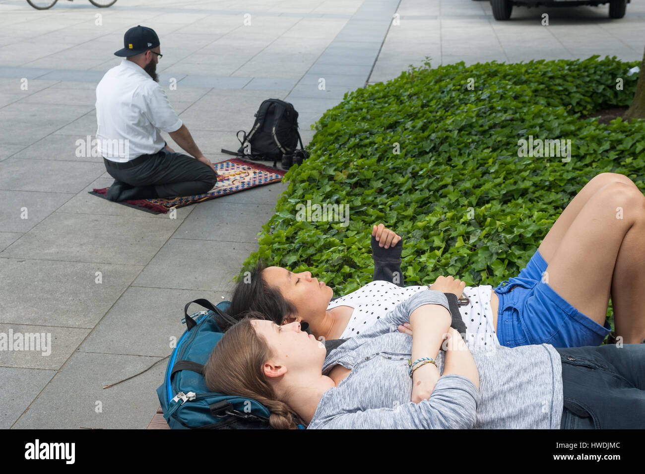 Berlin, Germany, a Muslim prays before the traditional Friday prayer ...