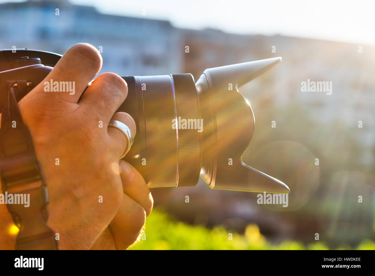 close up of photographers hands with camera Stock Photo - Alamy