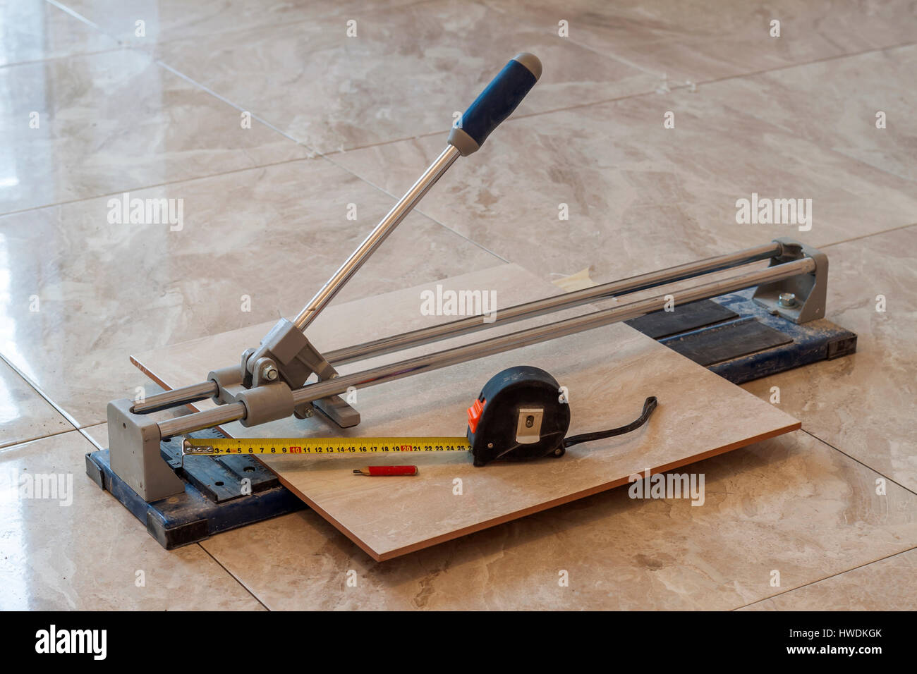 Ceramic tiles and tools for tiler. Floor tiles installation. Home ...