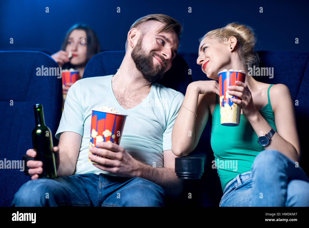 Friends in the cinema Stock Photo - Alamy