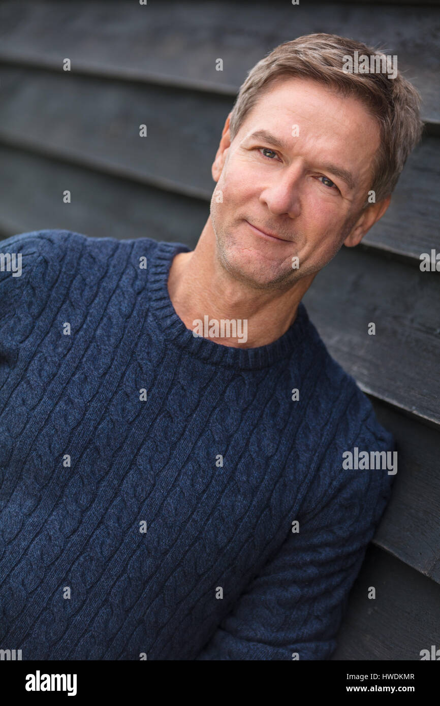 Portrait shot of an attractive, successful handsome and happy middle ...