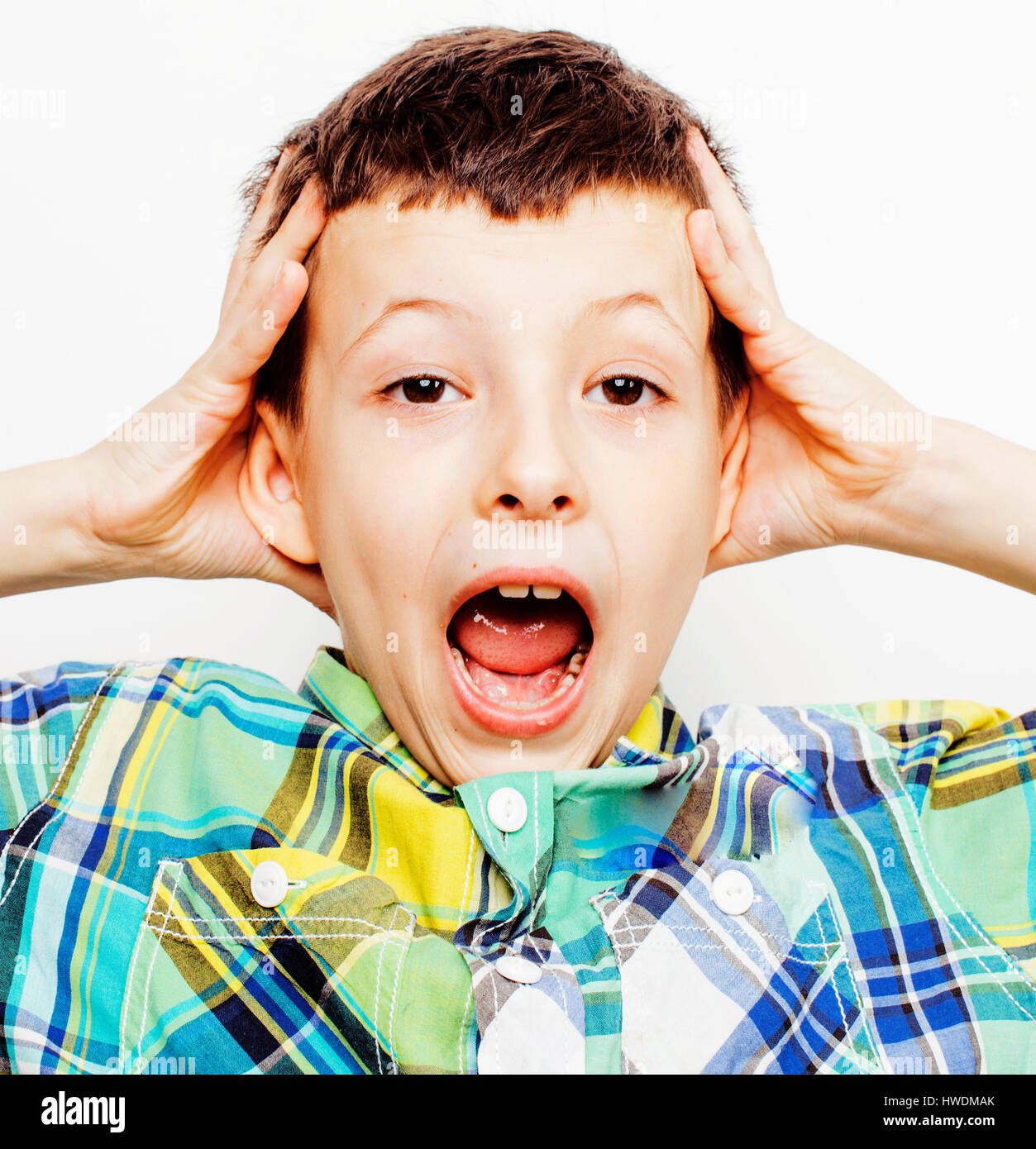 young pretty little cute boy kid wondering, posing emotional face ...