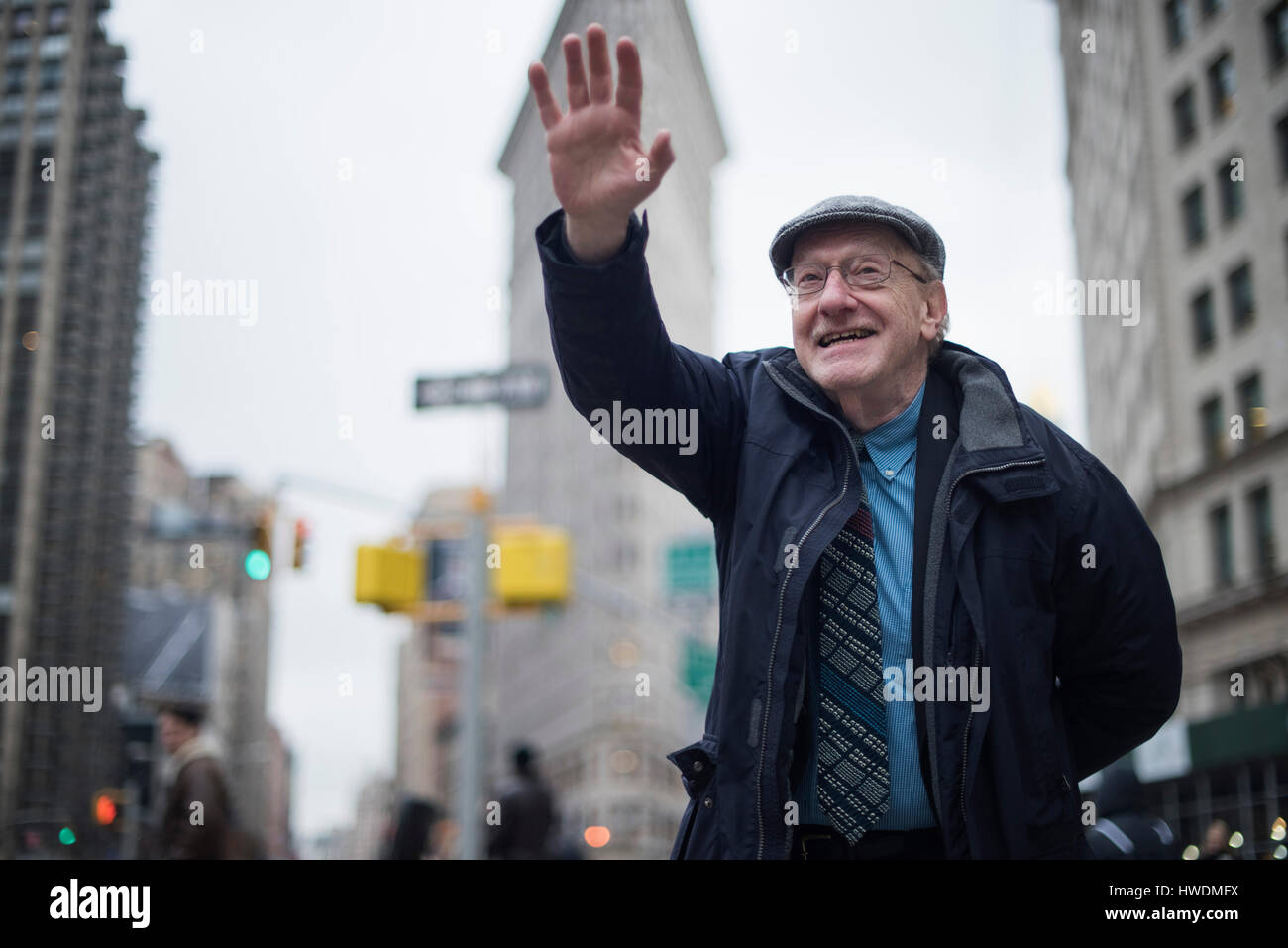 Man waving and smiling, Manhattan, New York, USA Stock Photo - Alamy