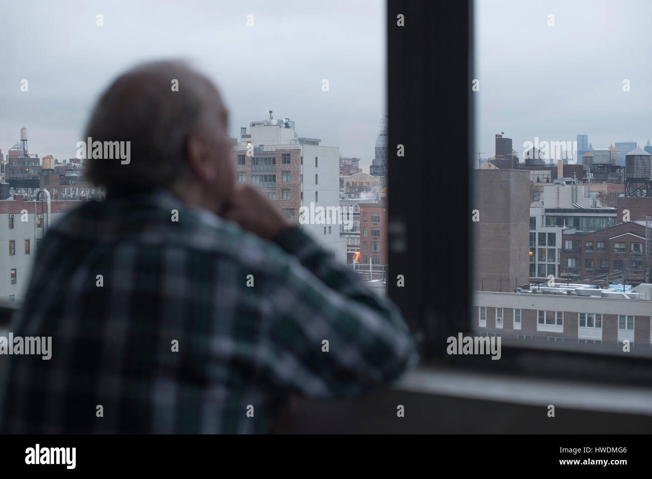 Looking out the window at manhattan hi-res stock photography and images ...