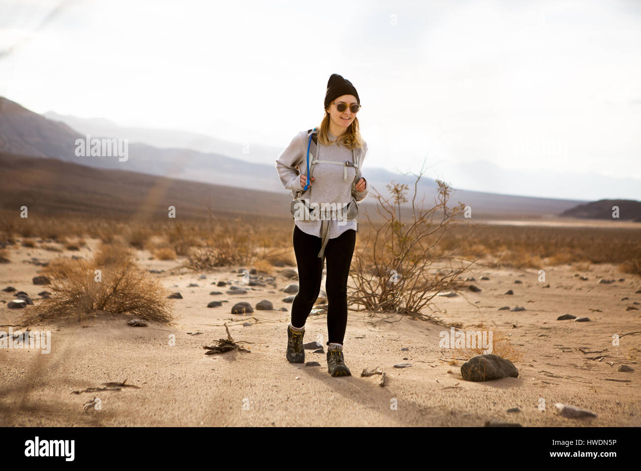 Trekker running in Death Valley National Park, California, US Stock ...