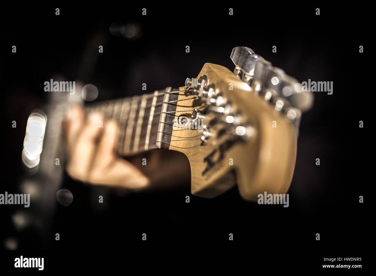 young man playing the electric guitar Stock Photo - Alamy
