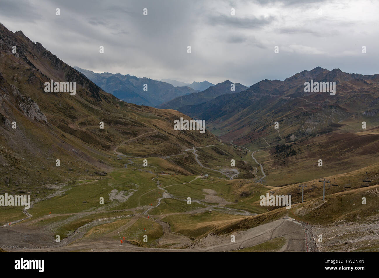 The Col du Tourmalet mountain road winding through the Pyrenees in ...