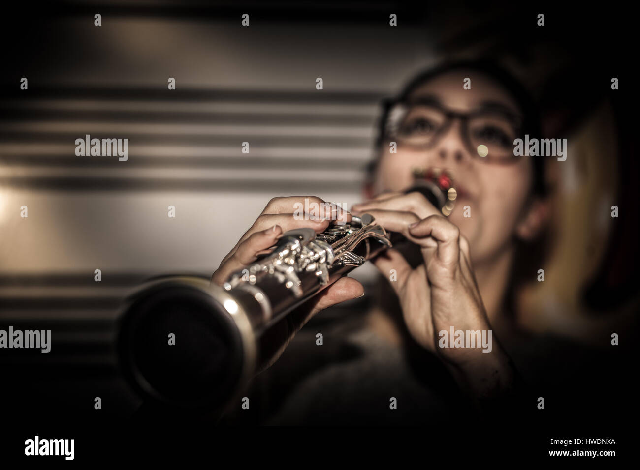 Girl playing clarinet hi-res stock photography and images - Alamy