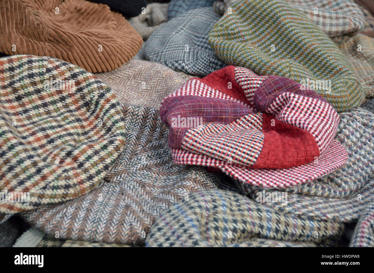 Display of traditional British flat caps on a market stall Stock Photo ...