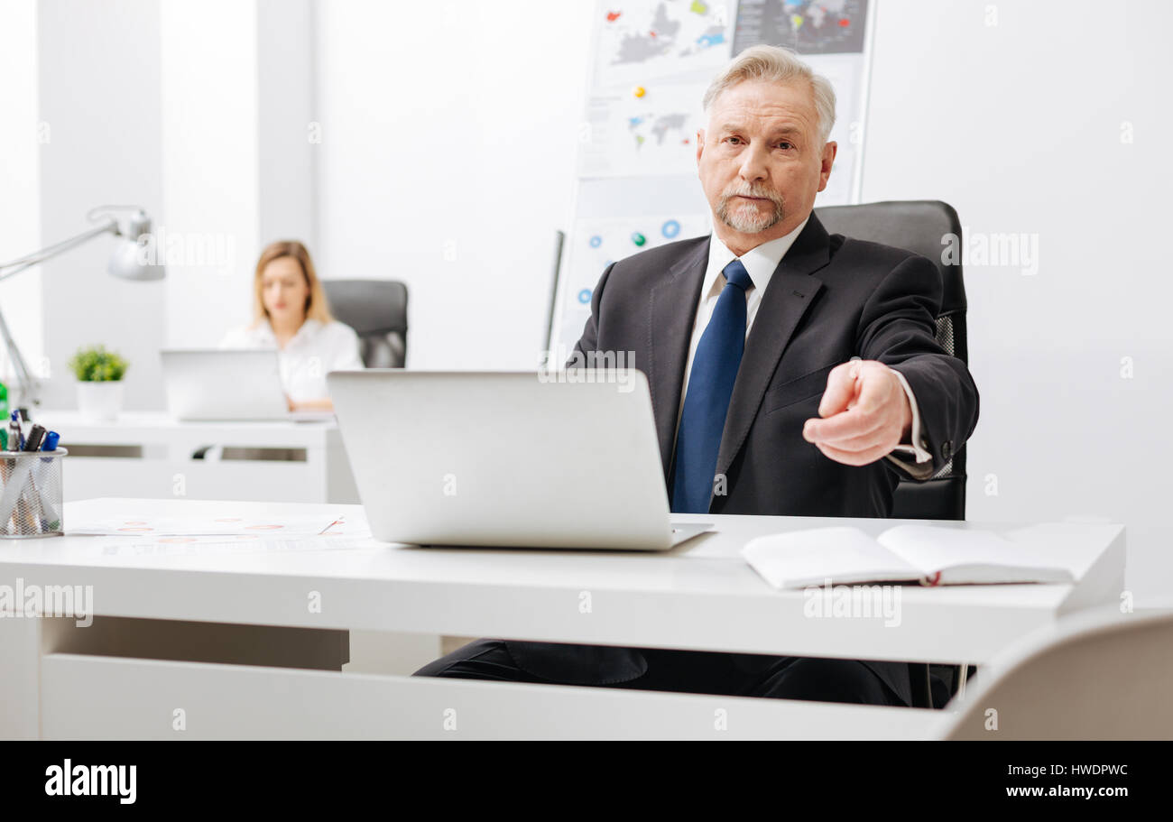 Bossy employer expressing emotions in the office Stock Photo - Alamy
