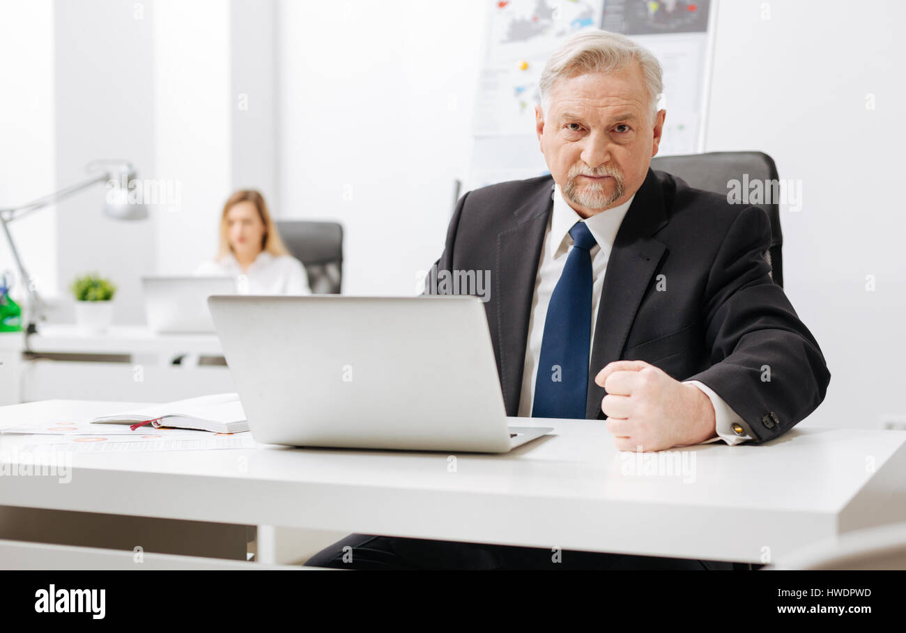 Impatient aged employer expressing fury in the office Stock Photo - Alamy
