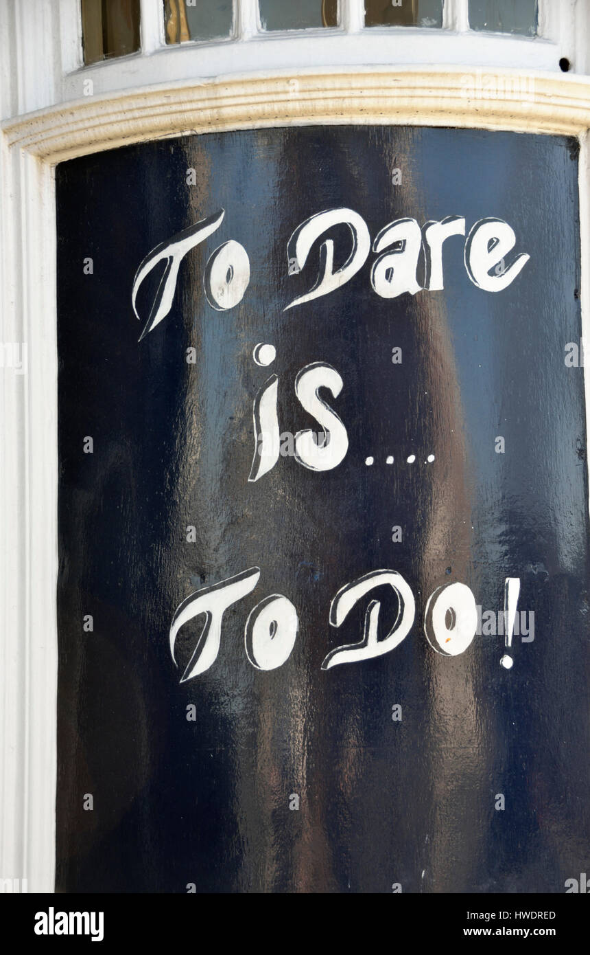 ’To dare is to do’ sign outside a building Stock Photo - Alamy