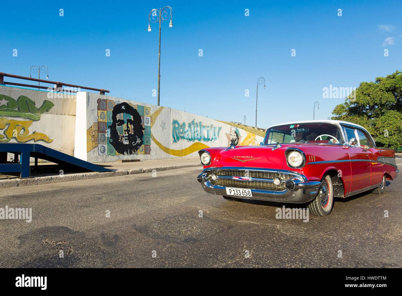 Cuba, Ciudad de la Habana Province, Havana, american car and mural ...