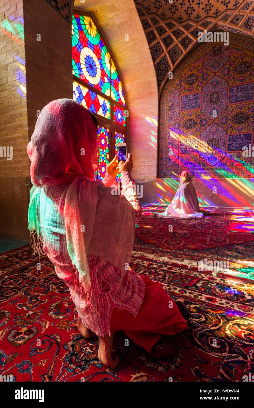 Iran, Central Iran, Shiraz, Nasir-al Molk Mosque, with women in robes ...