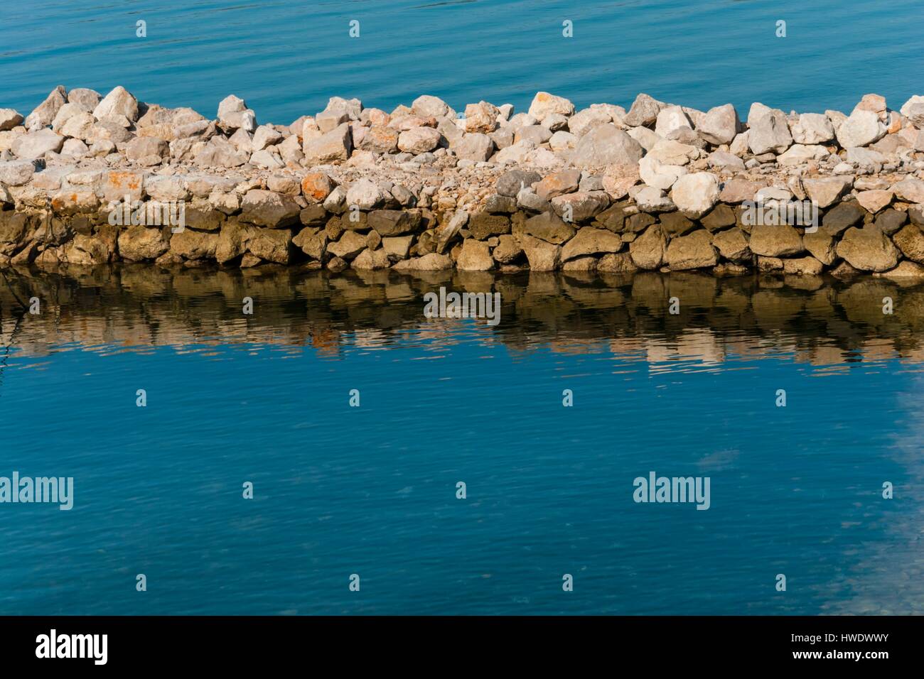 Stone-made traditionally built harbor quay Stock Photo - Alamy