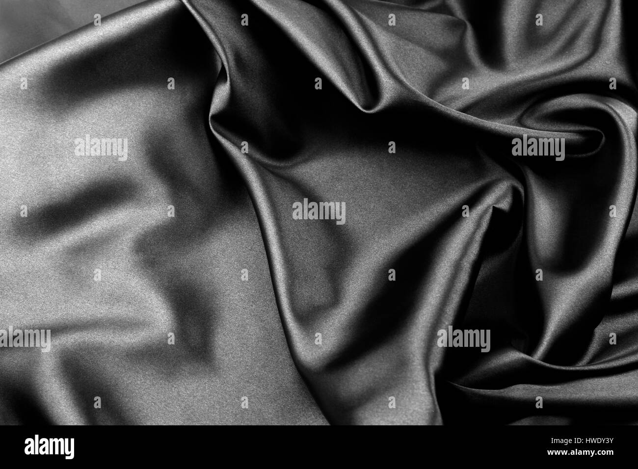 Closeup of rippled black silk fabric Stock Photo - Alamy