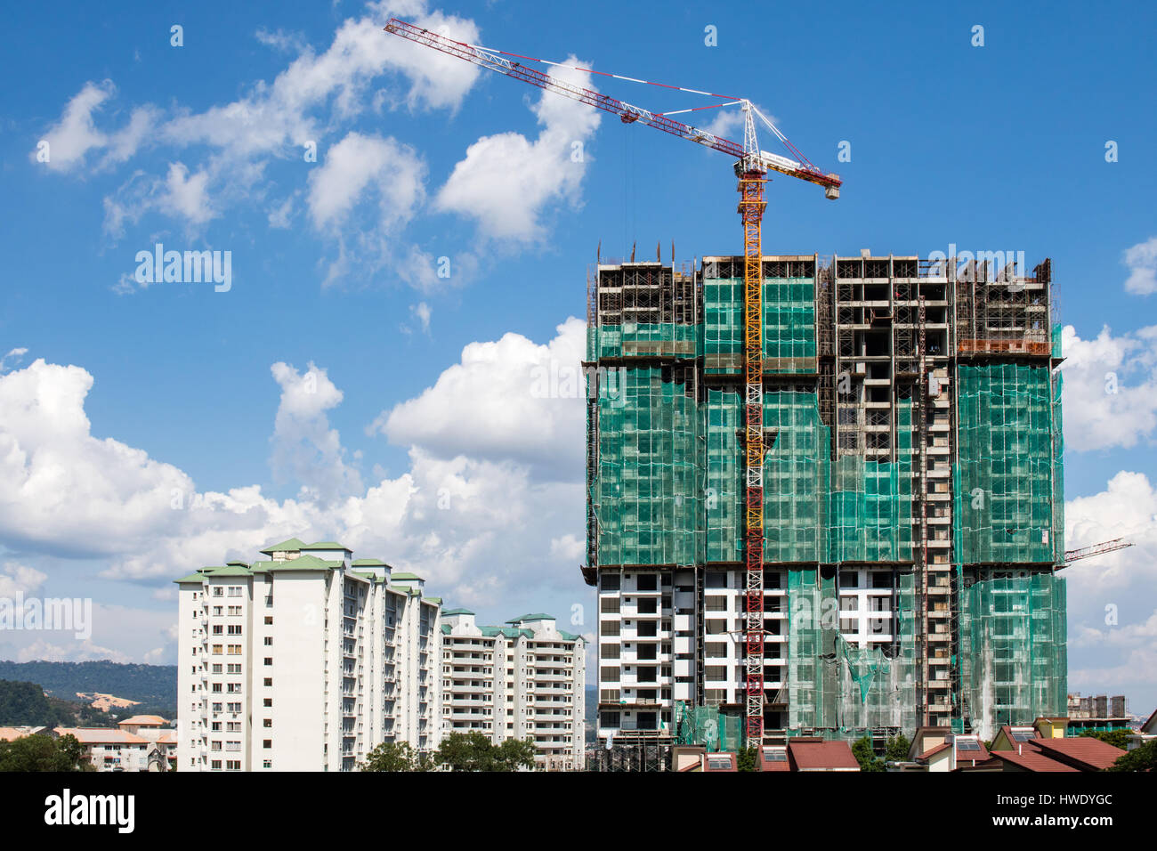 Construction Site with Crane against Blue Sky Stock Photo - Alamy