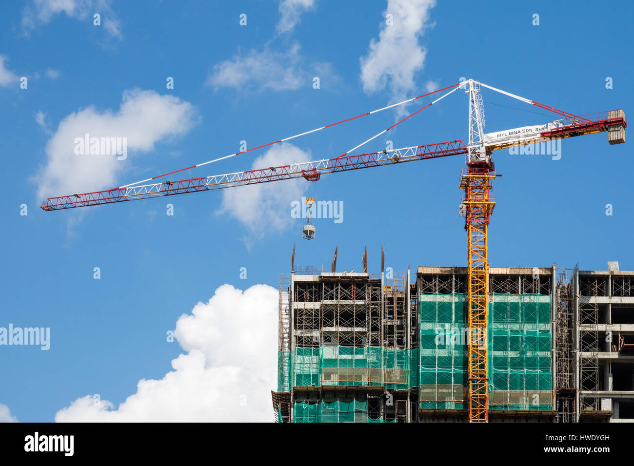 Construction Site with Crane against Blue Sky Stock Photo - Alamy