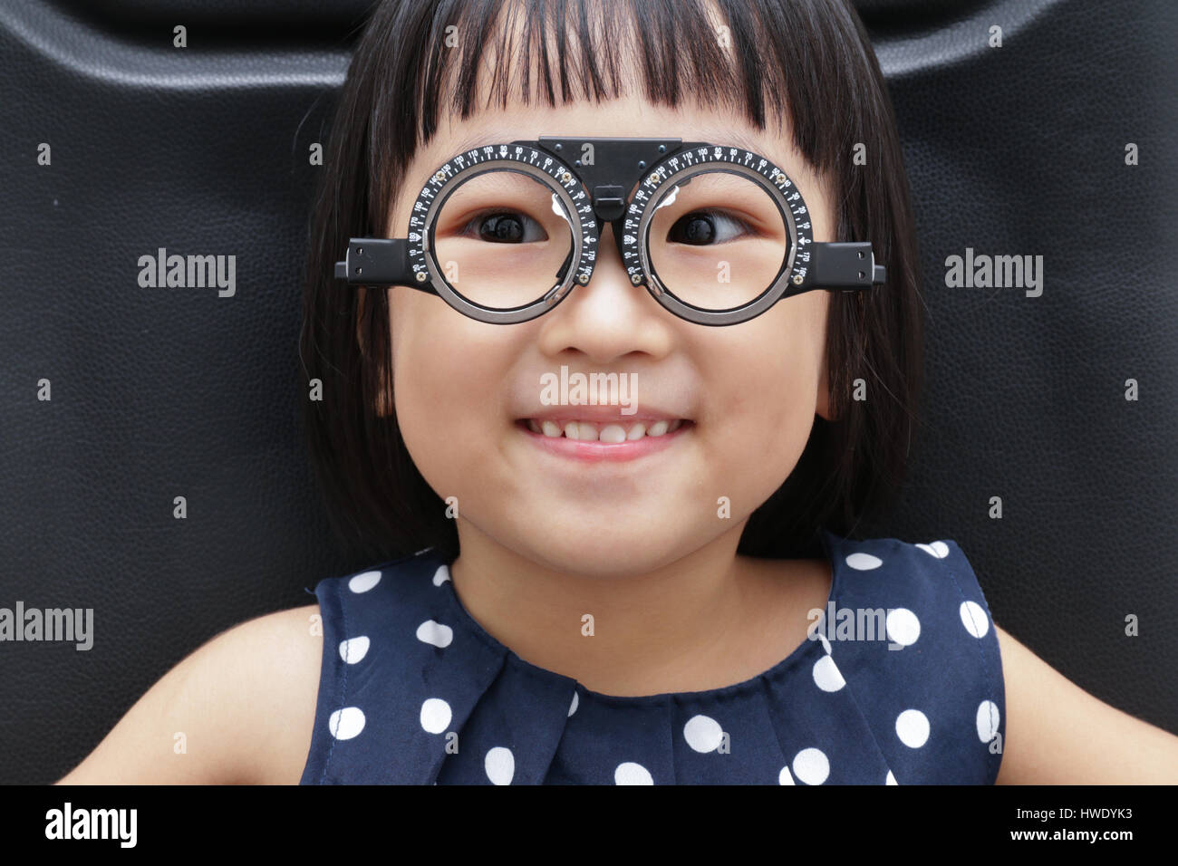 Asian Little Chinese Girl Doing Eyes Examination at An Optical Shop ...