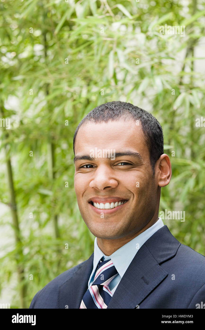 Portrait of a smiling businessman Stock Photo - Alamy
