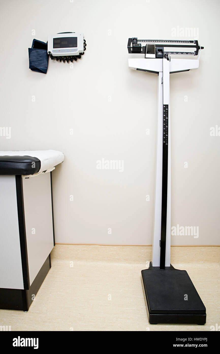 Scales in examination room Stock Photo - Alamy