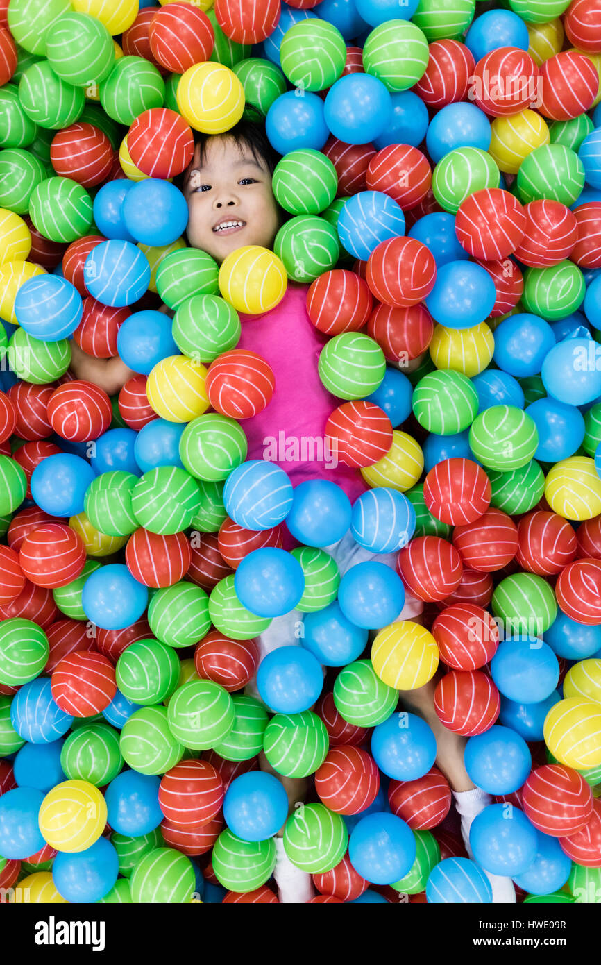 Cute chinese children playing balls hi-res stock photography and images ...