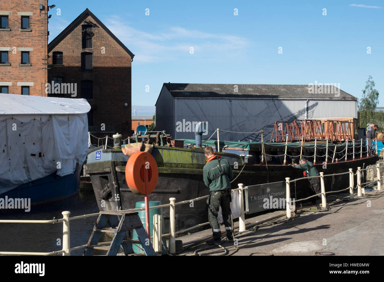 Barge Sabrina 5 being moved to dry dock for restoration and maintenance ...